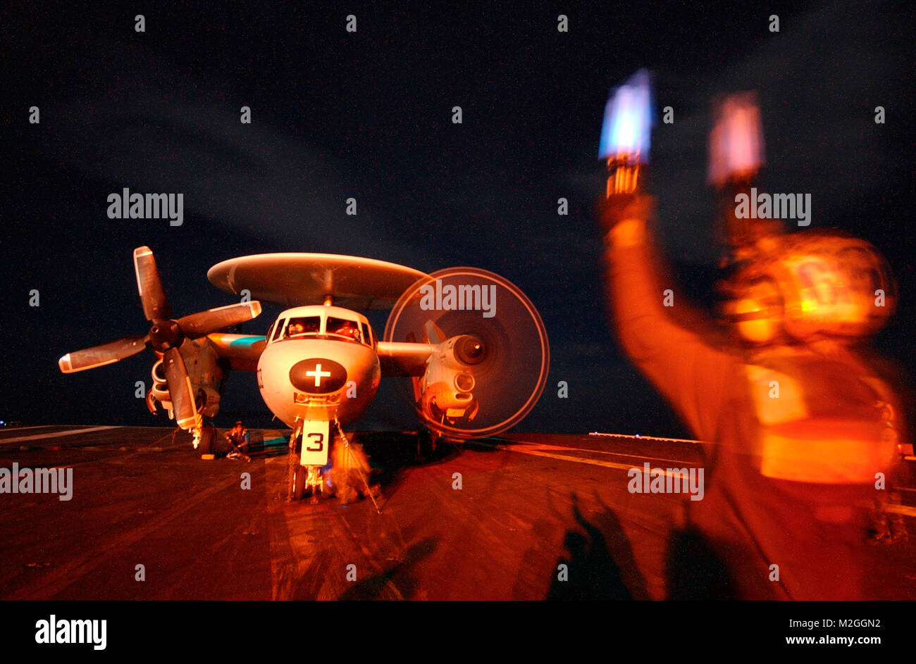 A plane captain for the "Golden Hawks" of Carrier Airborne Early ...