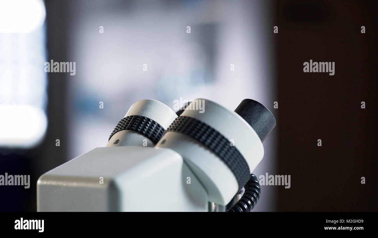 Professional microscope standing in laboratory, medical research ...