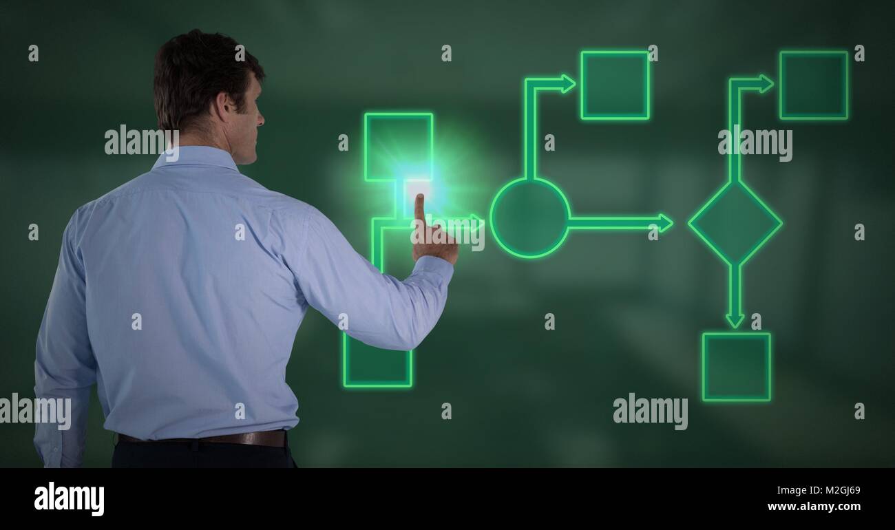 Man's Hand touching green wireframe Stock Photo - Alamy