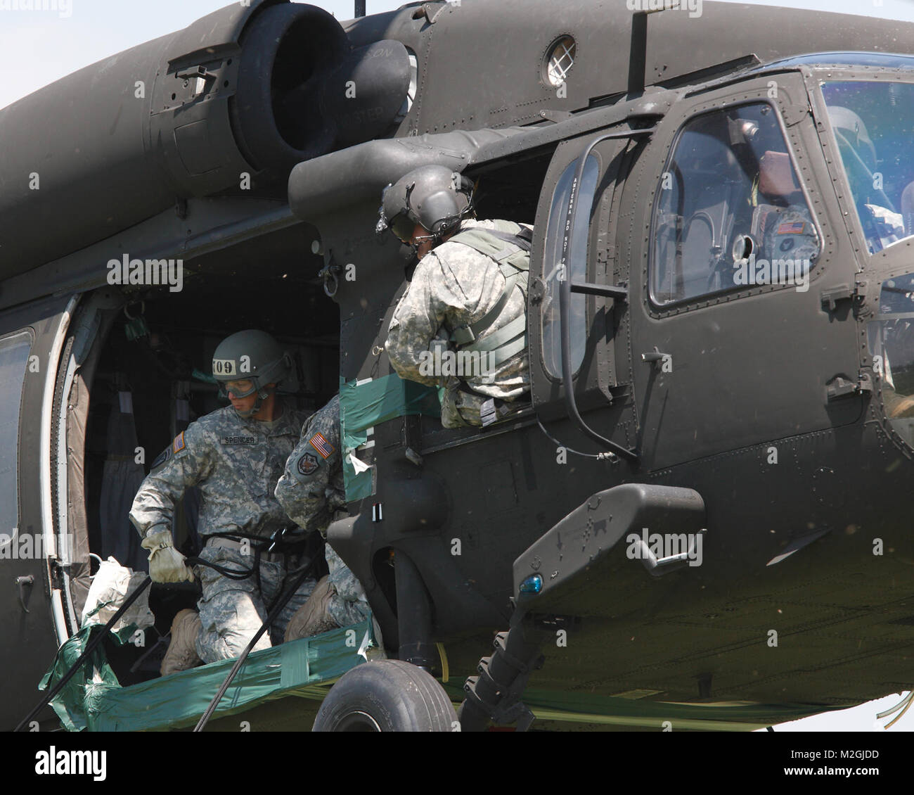 Students in the Army Air Assault School repel from a UH-60 helicopter ...