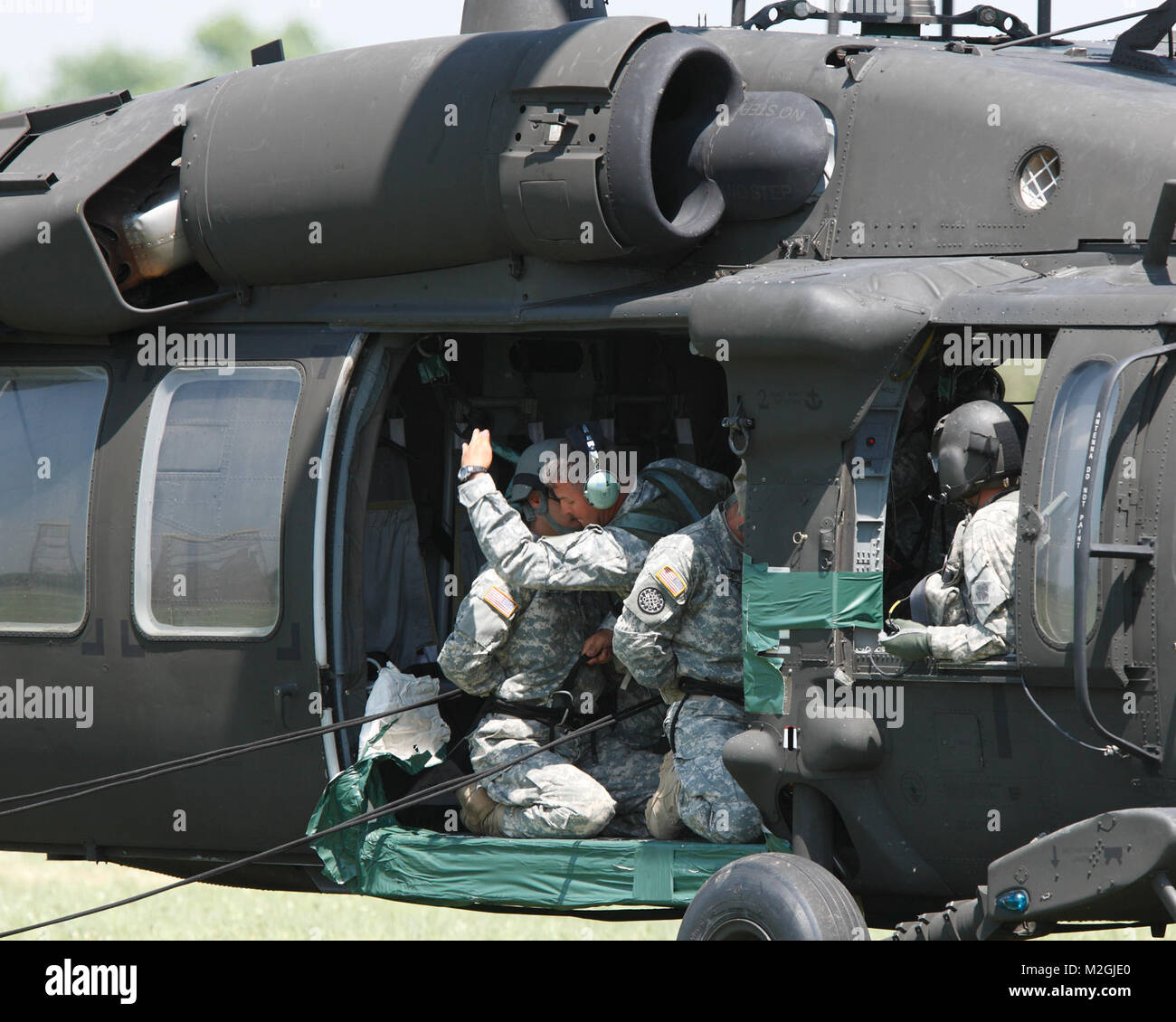 Students in the Army Air Assault School repel from a UH-60 helicopter ...
