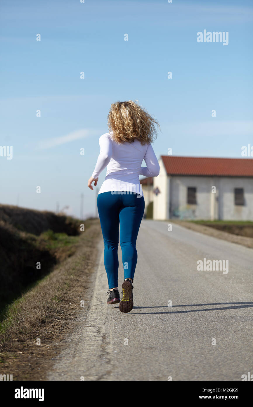 Running woman hi-res stock photography and images - Alamy