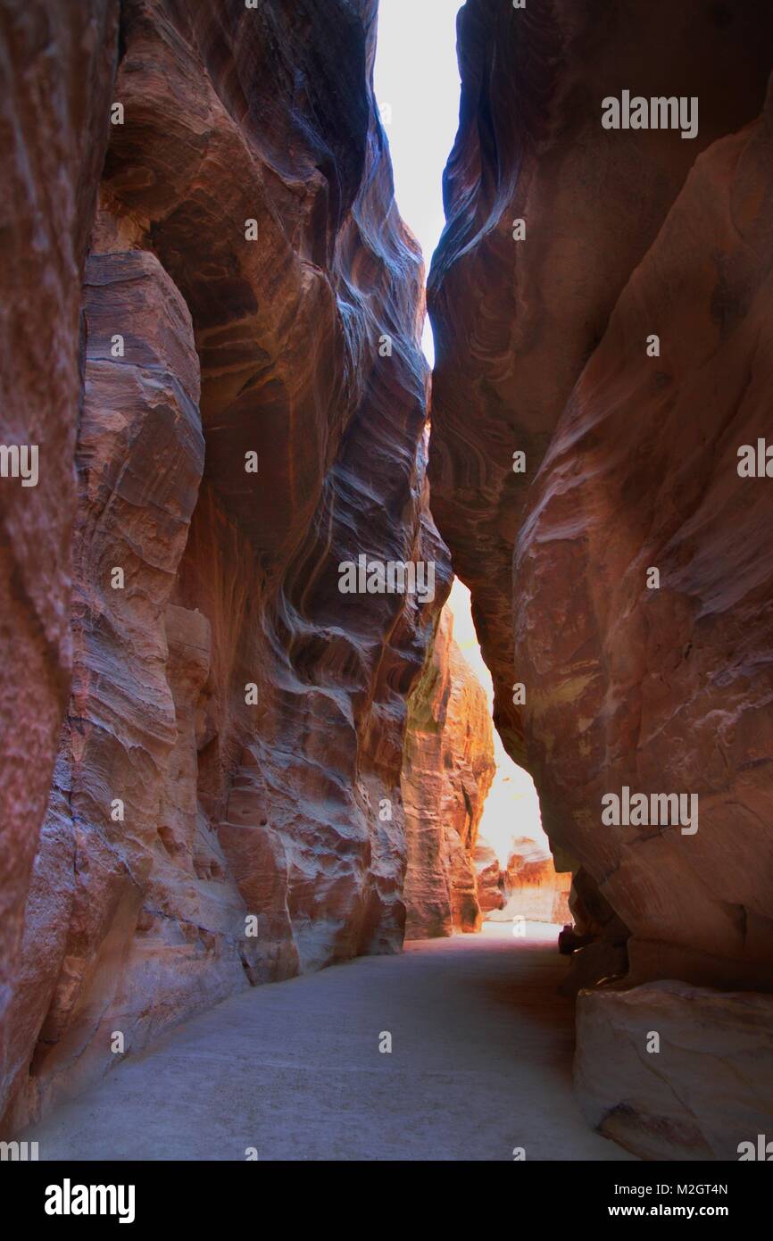 Narrow path to Al Khazneh (Treasury) located at Rose city, Petra ...