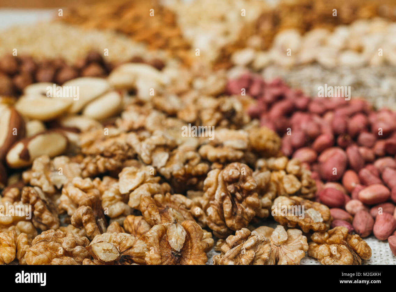 Nuts mix in a canvas bag in table Stock Photo - Alamy