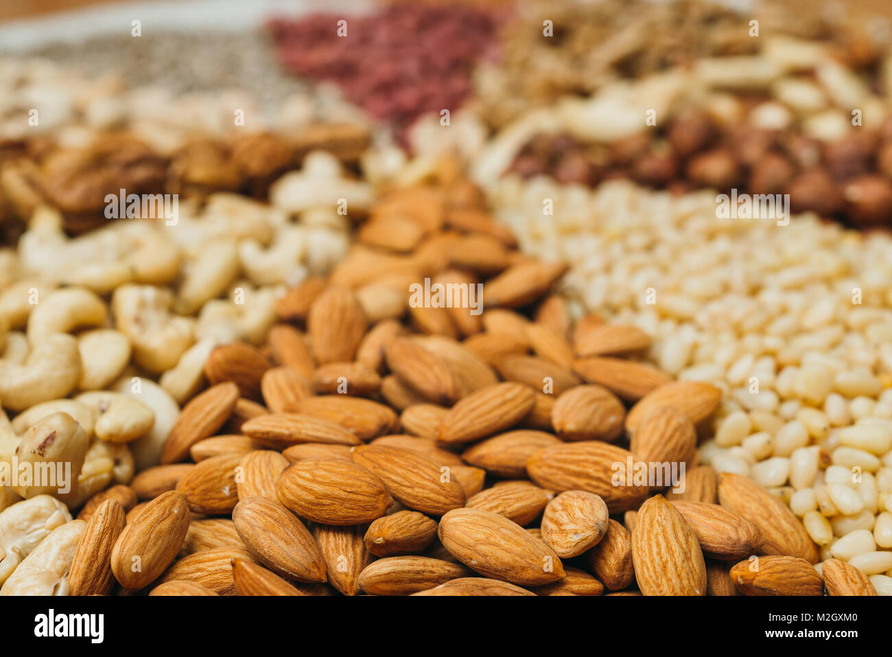 Nuts mix in a canvas bag in table Stock Photo - Alamy