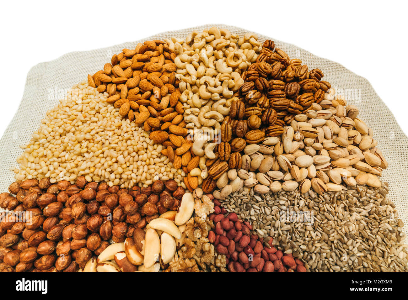 Nuts mix in a canvas bag in table Stock Photo - Alamy