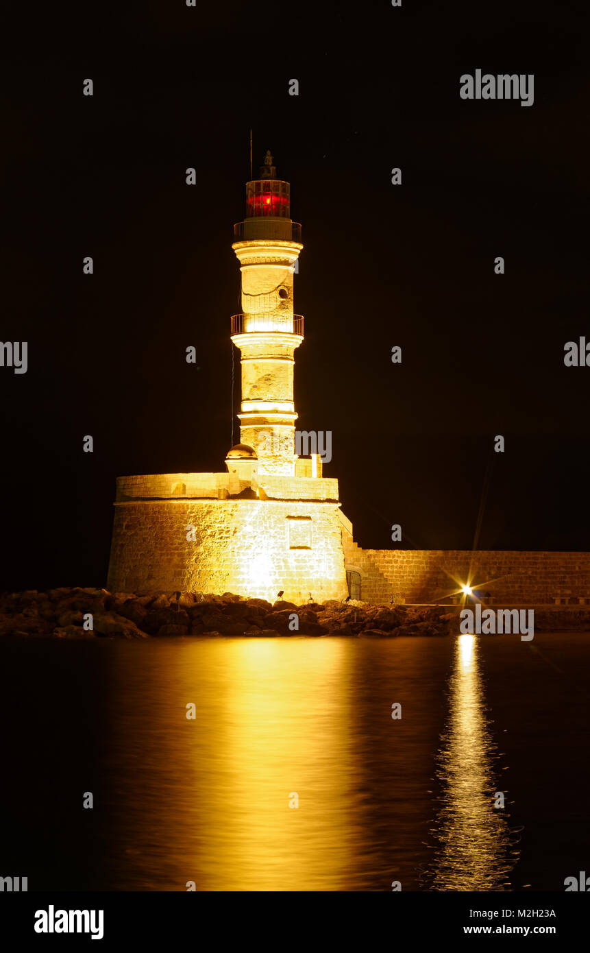 Lighthouse of Chania by night Stock Photo - Alamy