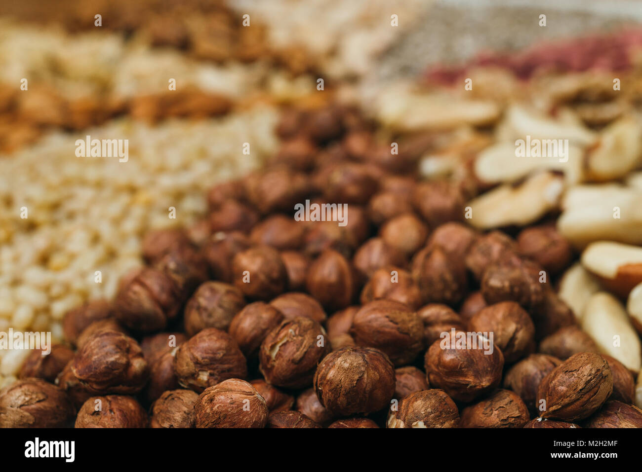 Nuts mix in a canvas bag in table Stock Photo - Alamy