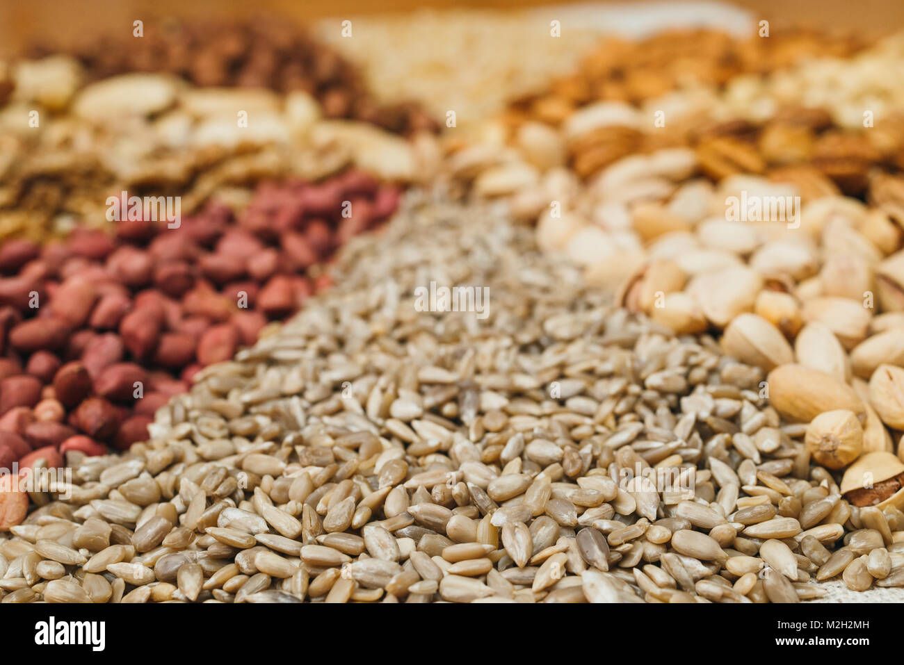 Nuts mix in a canvas bag in table Stock Photo - Alamy