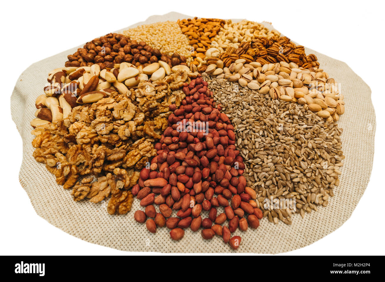 Nuts mix in a canvas bag in table Stock Photo - Alamy