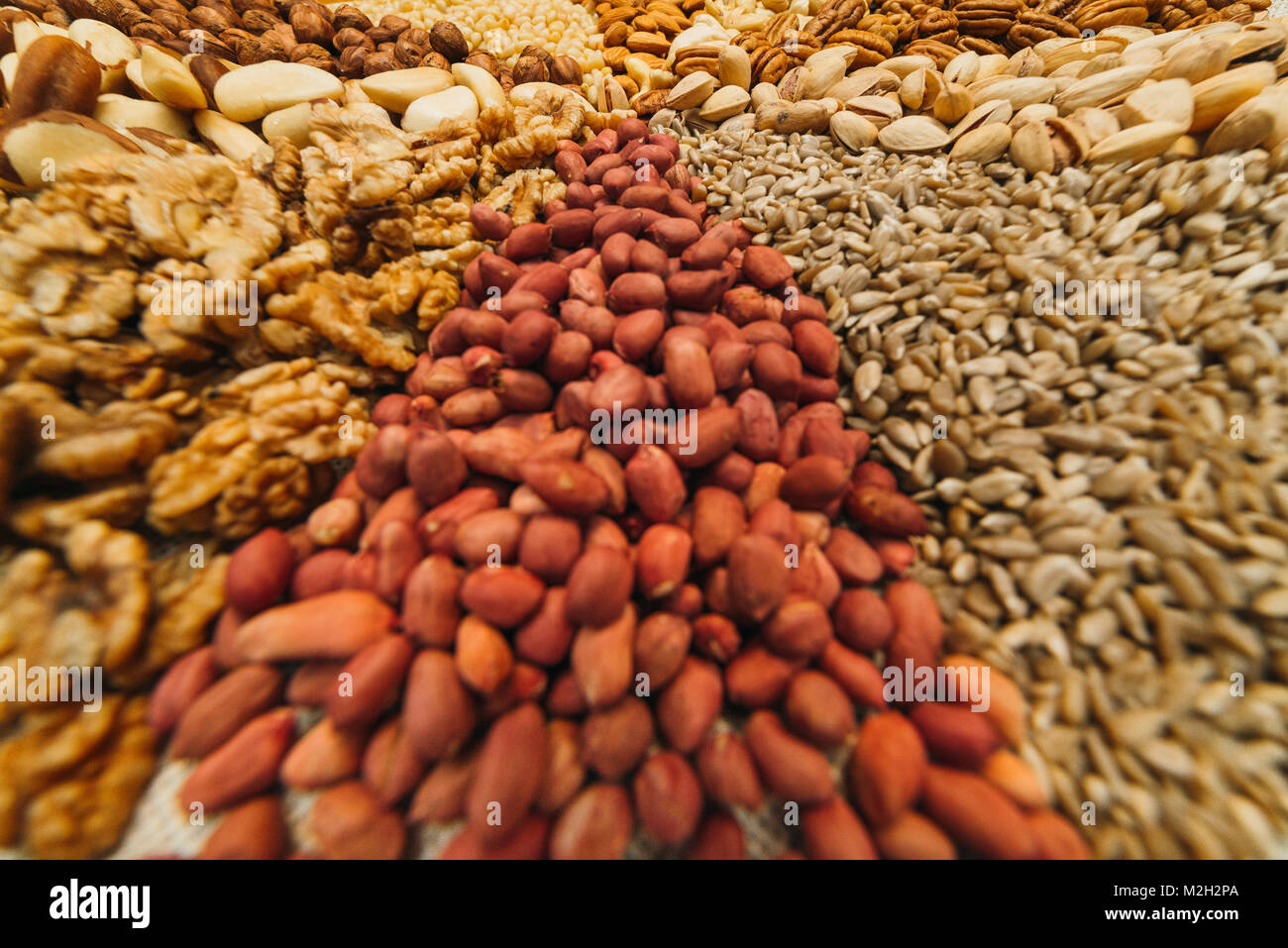 Nuts mix in a canvas bag in table Stock Photo - Alamy
