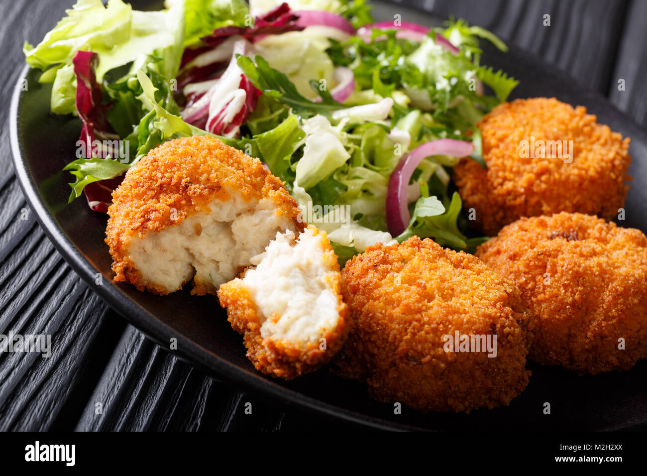 Breaded fish cake on plate hi-res stock photography and images - Alamy
