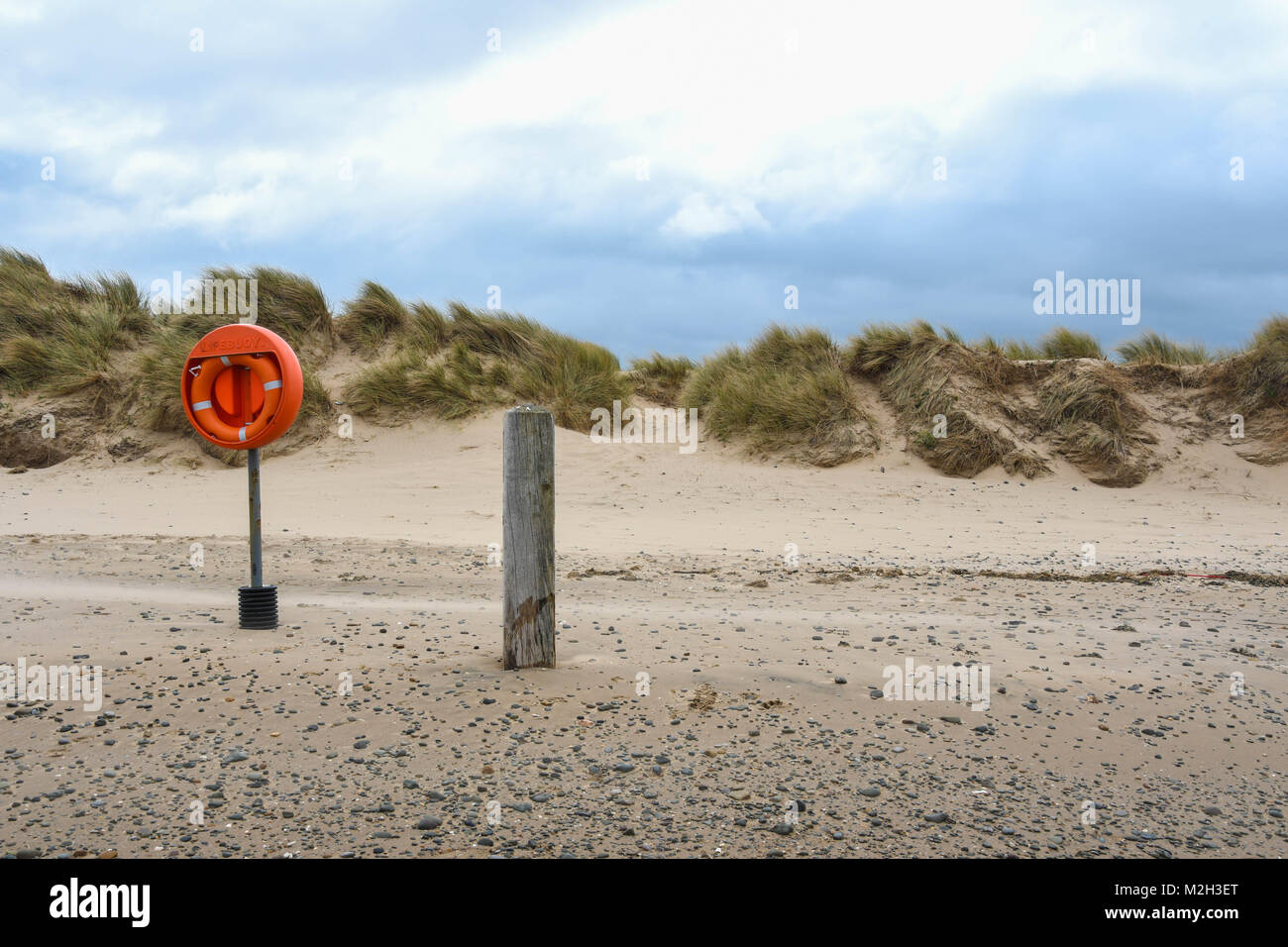 sand dunes at talacre beach in gloomy wales Stock Photo - Alamy