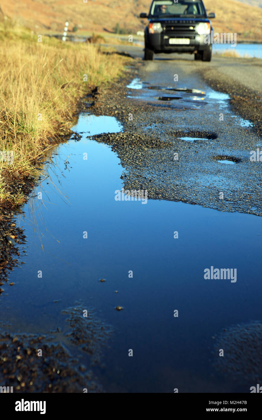 Potholes on rural Scottish roads Stock Photo - Alamy