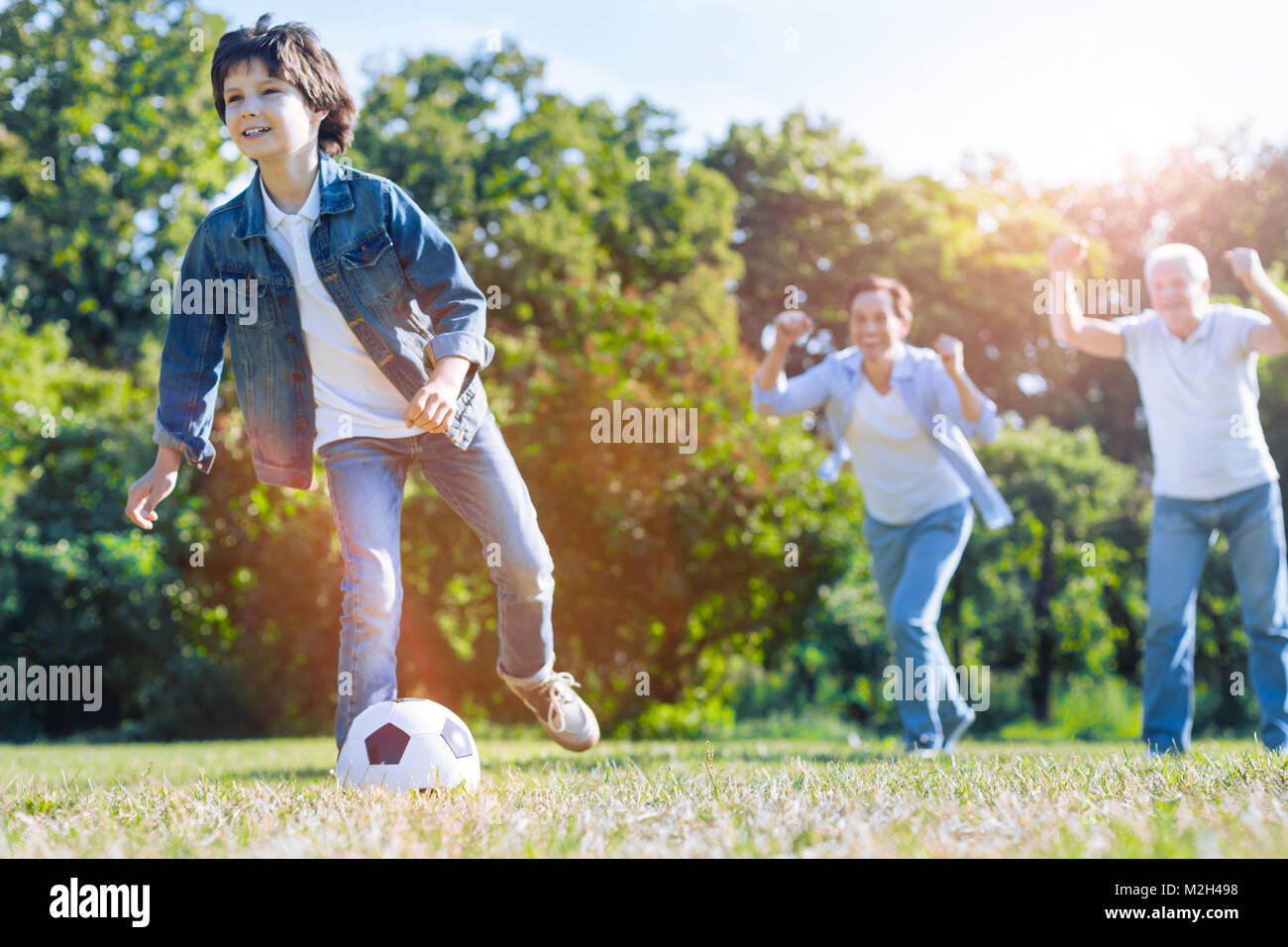 Child cheering stadium hi-res stock photography and images - Alamy