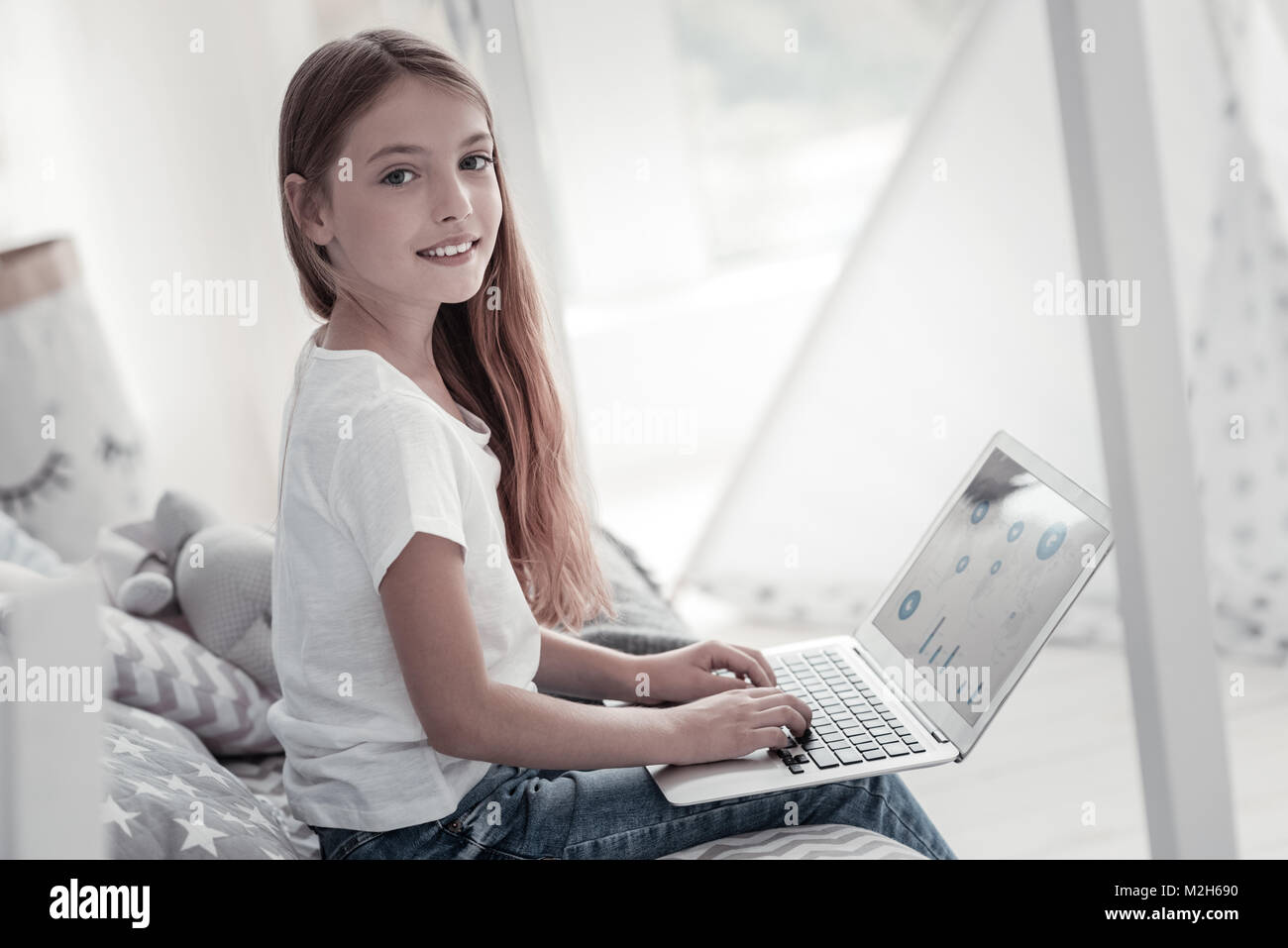 Beautiful lovely girl working on the laptop Stock Photo - Alamy