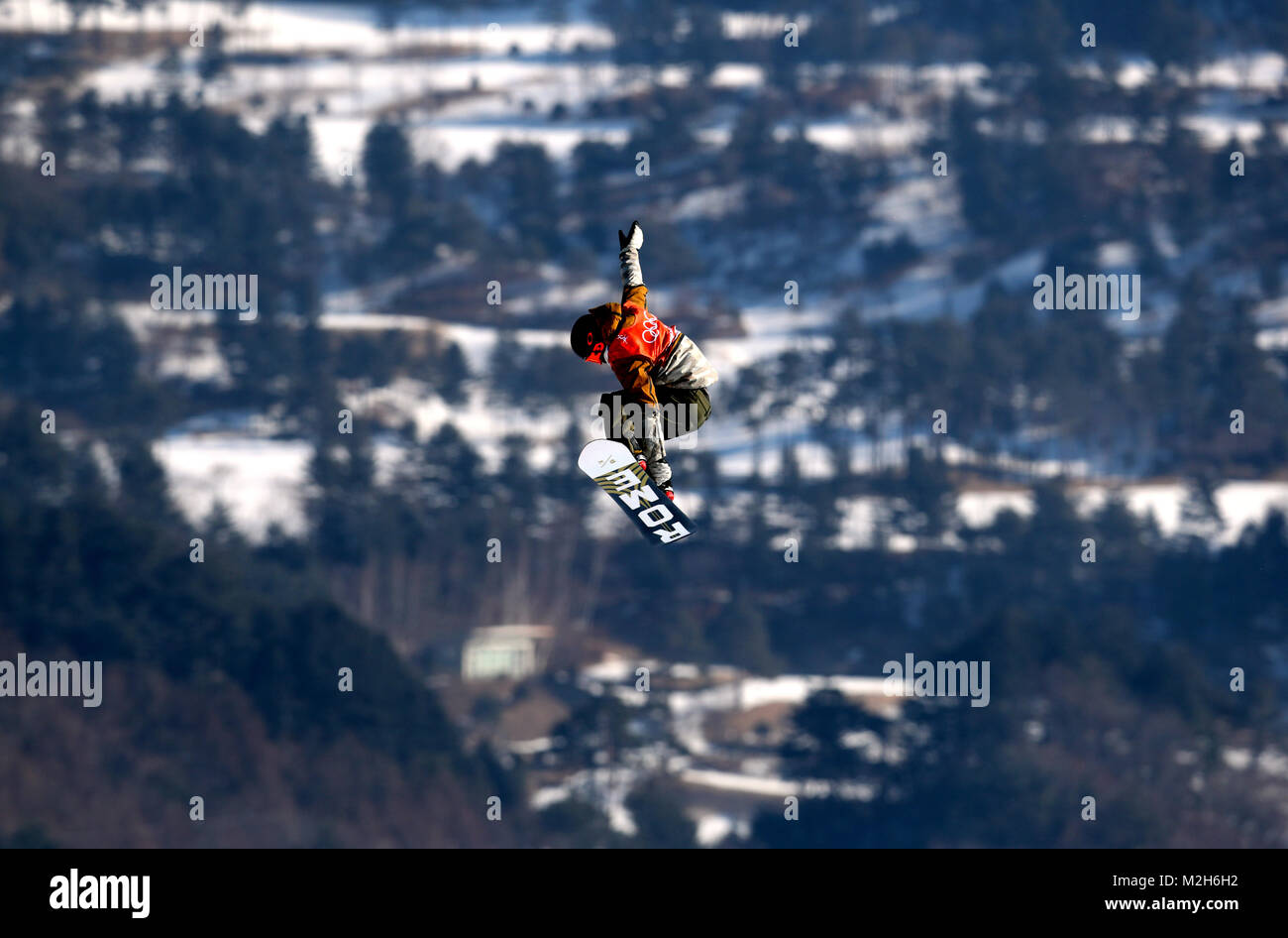 An athlete trains during the Snowboard practice during a preview day at ...