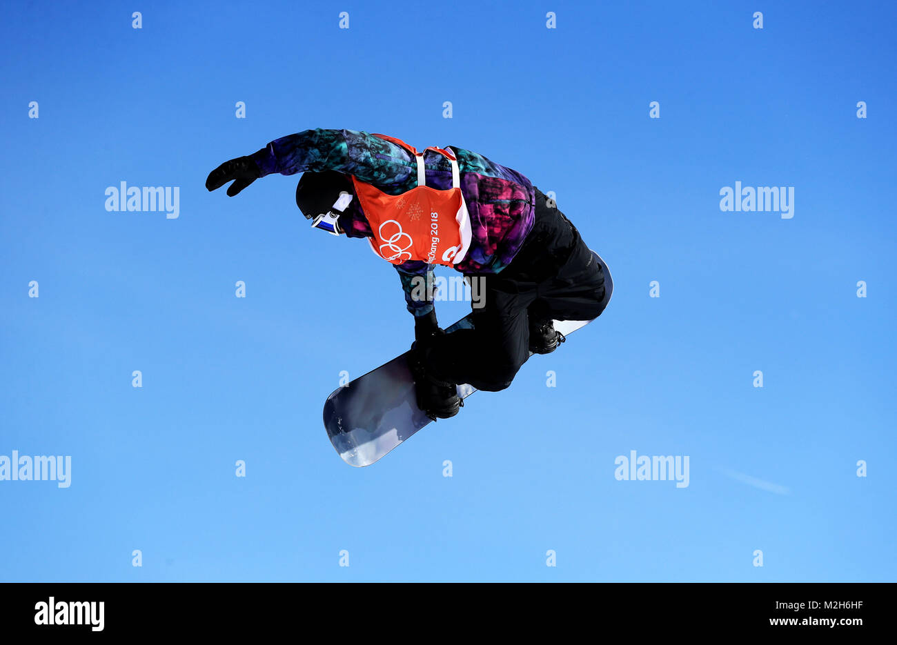 An athlete trains during the Snowboard practice during a preview day at ...