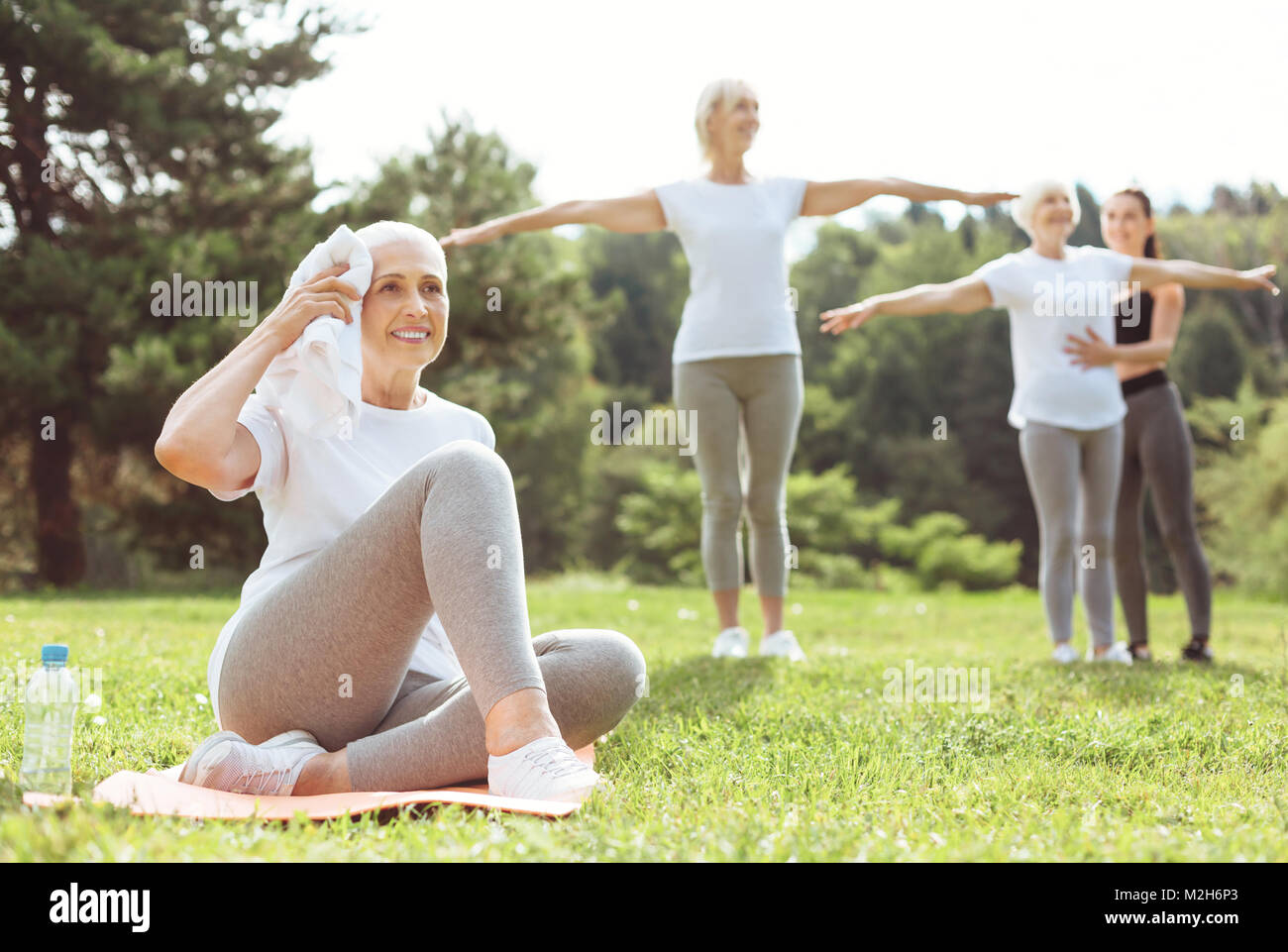 Happy delighted woman having a break Stock Photo - Alamy