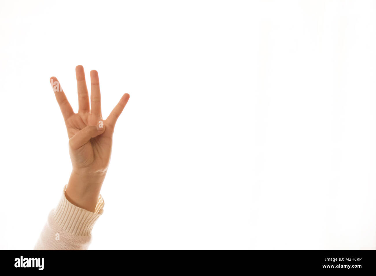 A hand sign indicating the number four Stock Photo - Alamy