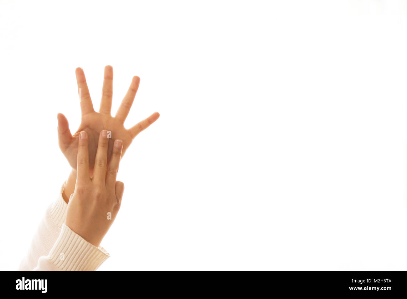A hand sign indicating the number eight Stock Photo - Alamy