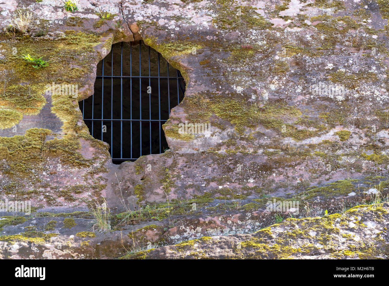 Latticed window in a rock face Stock Photo - Alamy