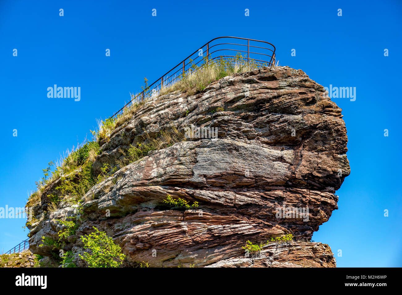 Viewpoint on a cliff with railing in Alsace, France Stock Photo - Alamy