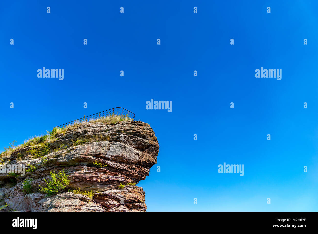 Viewpoint on a cliff with railing in Alsace, France Stock Photo - Alamy
