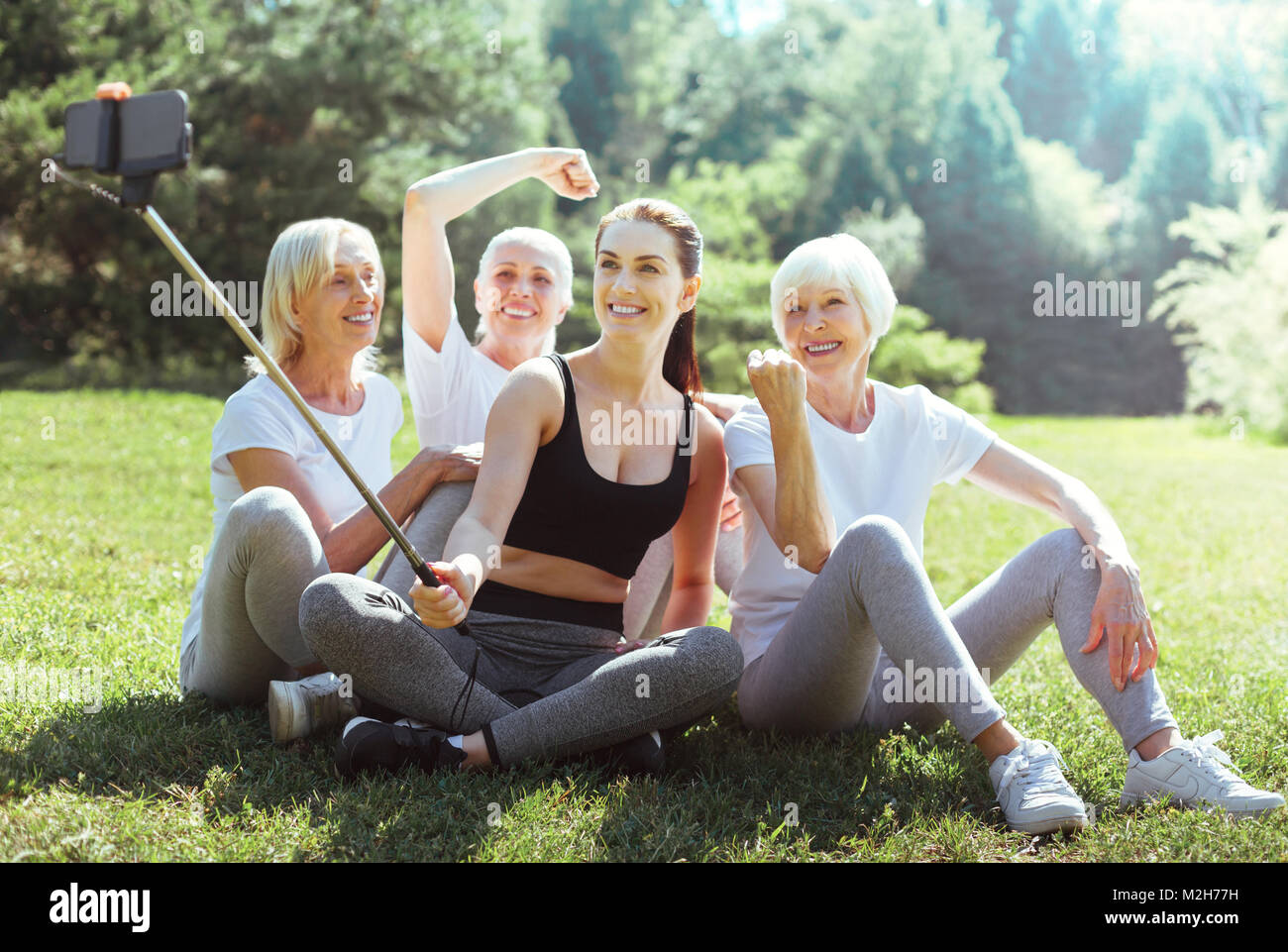 Happy positive women taking selfie Stock Photo - Alamy