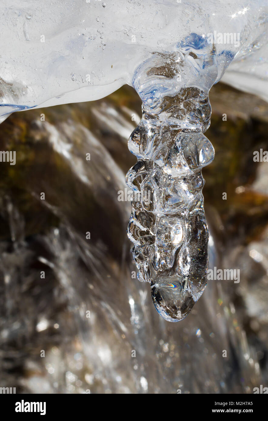 Drop waiting to leave an icicle on a waterfall in North Carolina Stock ...