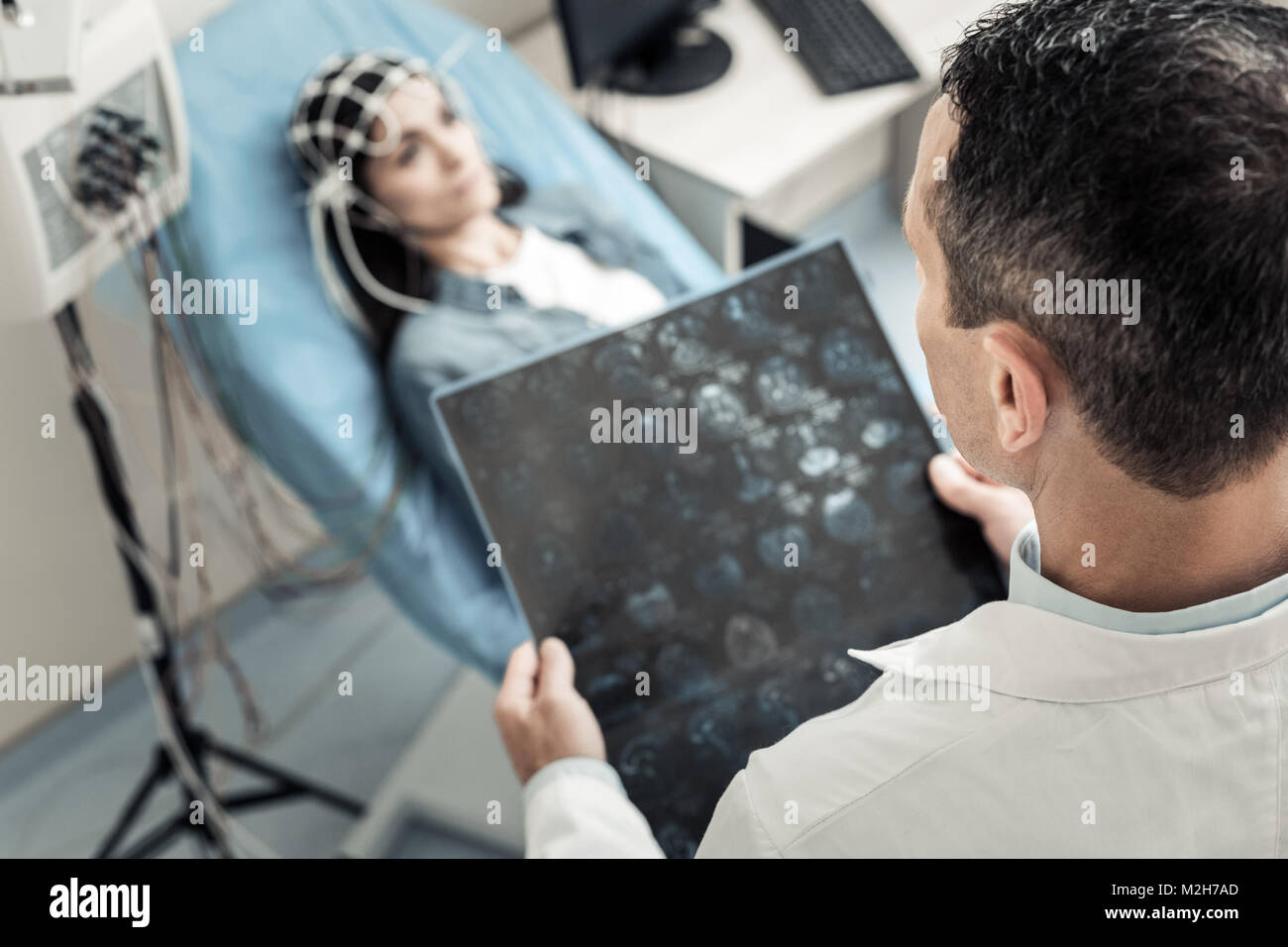 Professional experienced doctor putting a diagnosis Stock Photo - Alamy