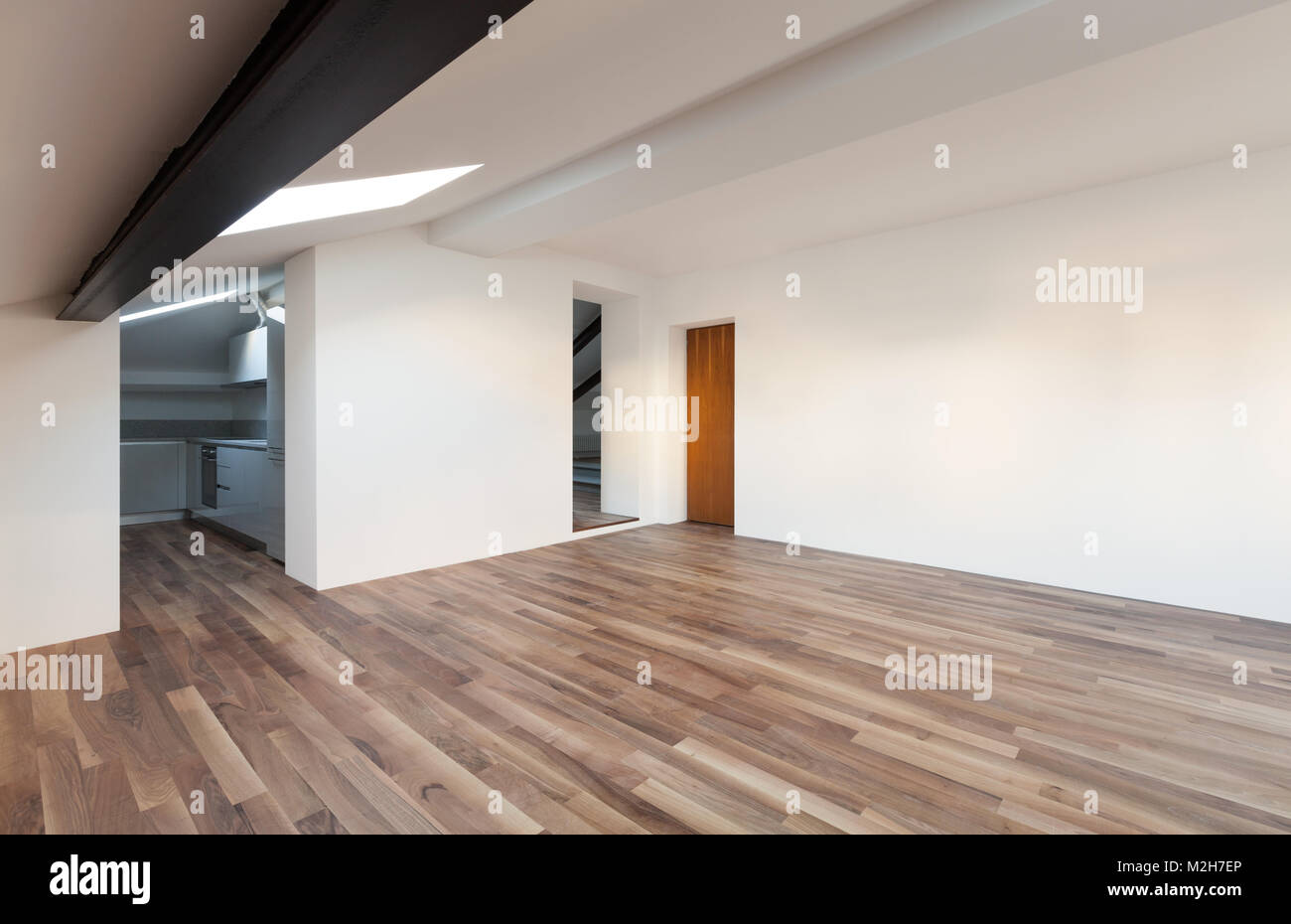 Interior nice loft, wall white, parquet floor Stock Photo - Alamy