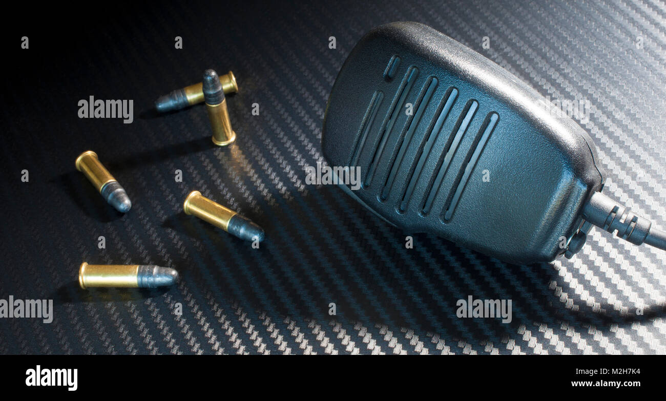 Five rim fire bullets that are with a police microphone Stock Photo - Alamy