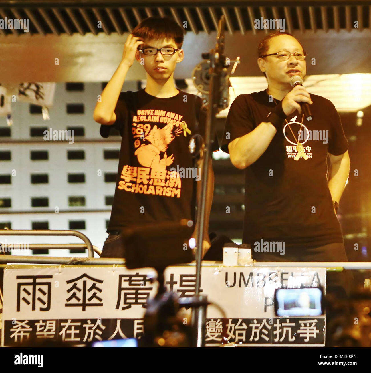 Joshua Wong Chi-fung (l), leader and founder of the student activist ...