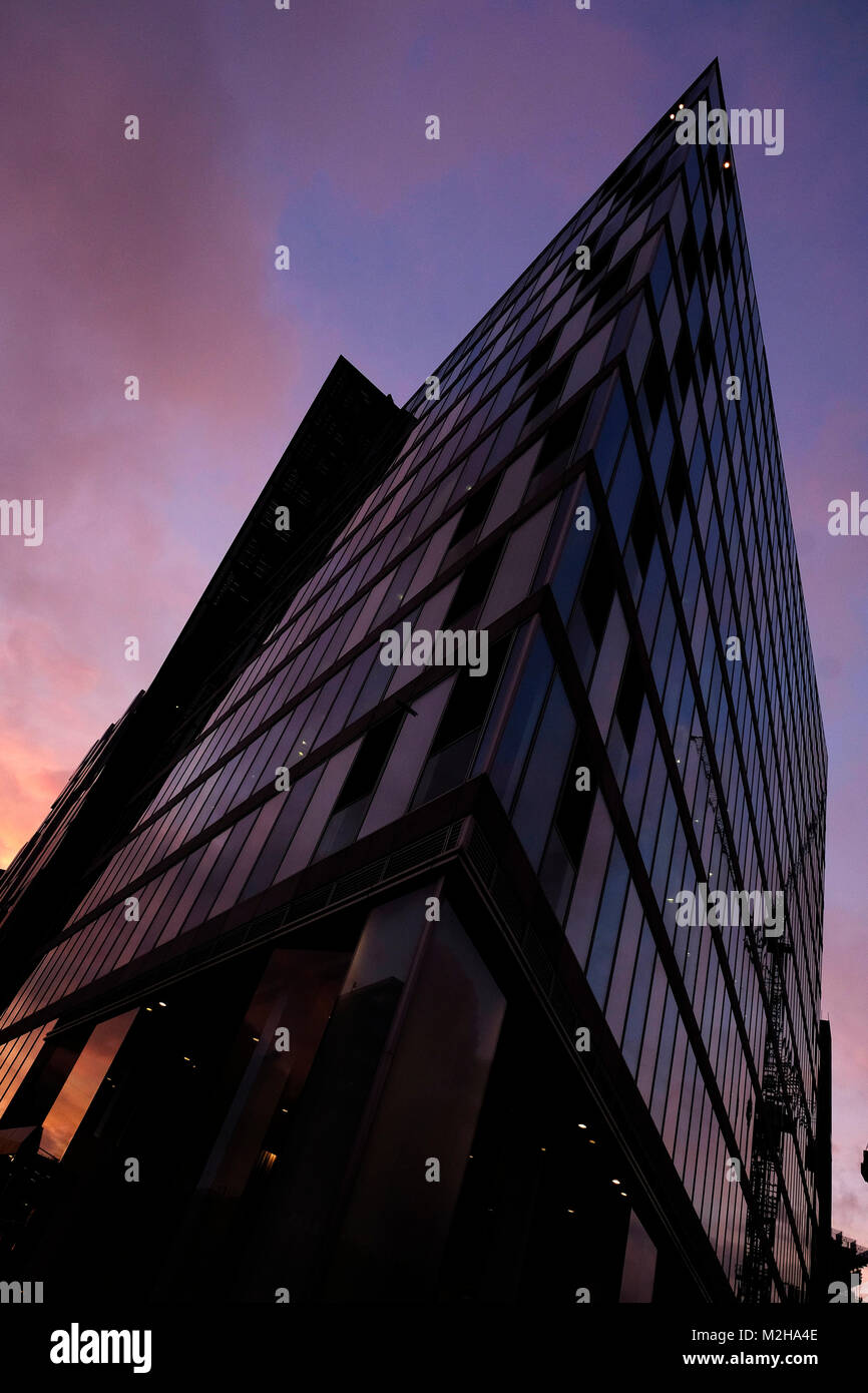 an angular building exterior at dusk Stock Photo - Alamy
