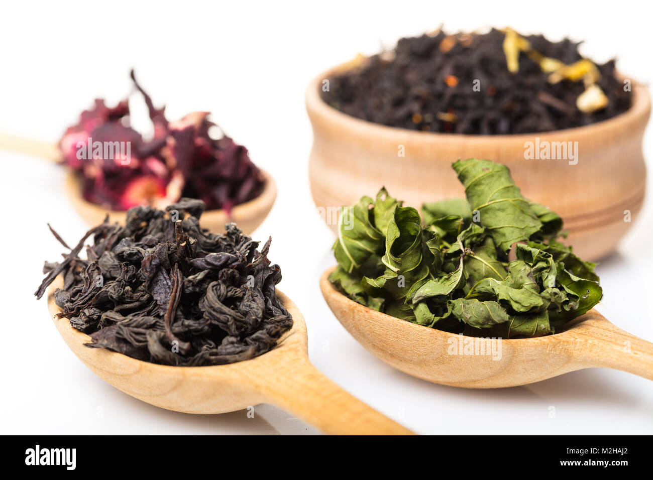 set of dry teas on white isolated background Stock Photo - Alamy