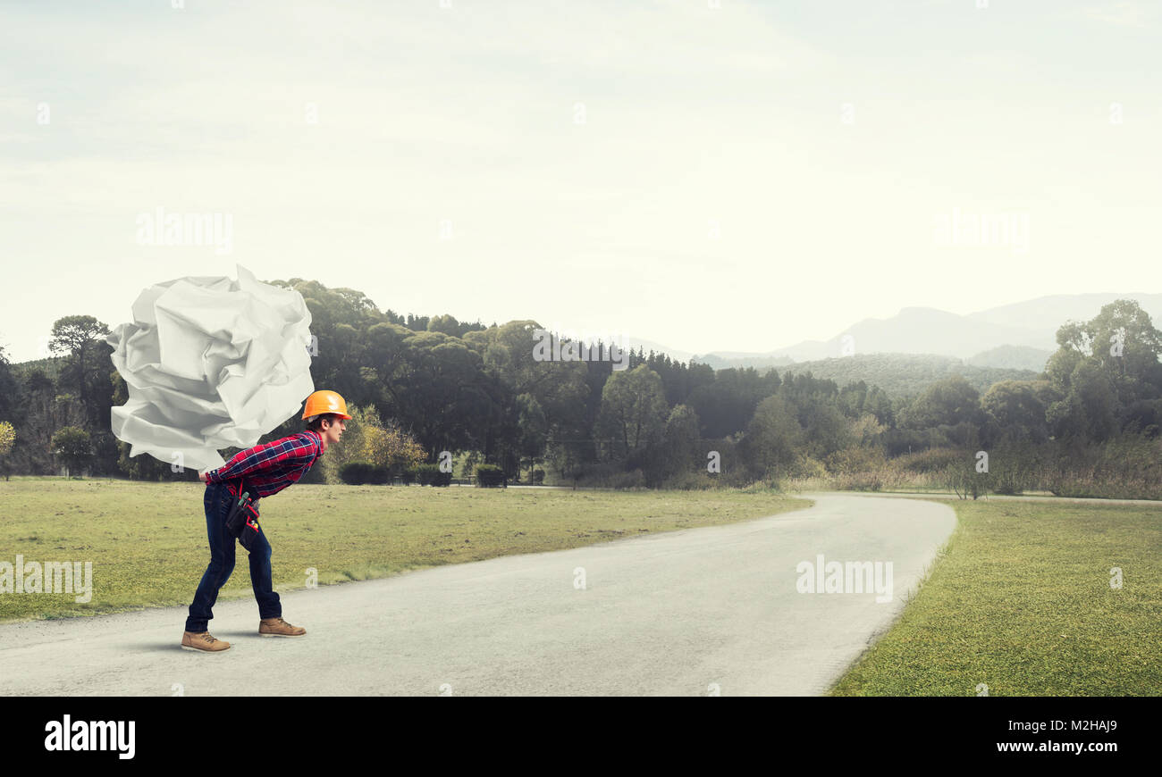 Engineer man carry load Stock Photo - Alamy