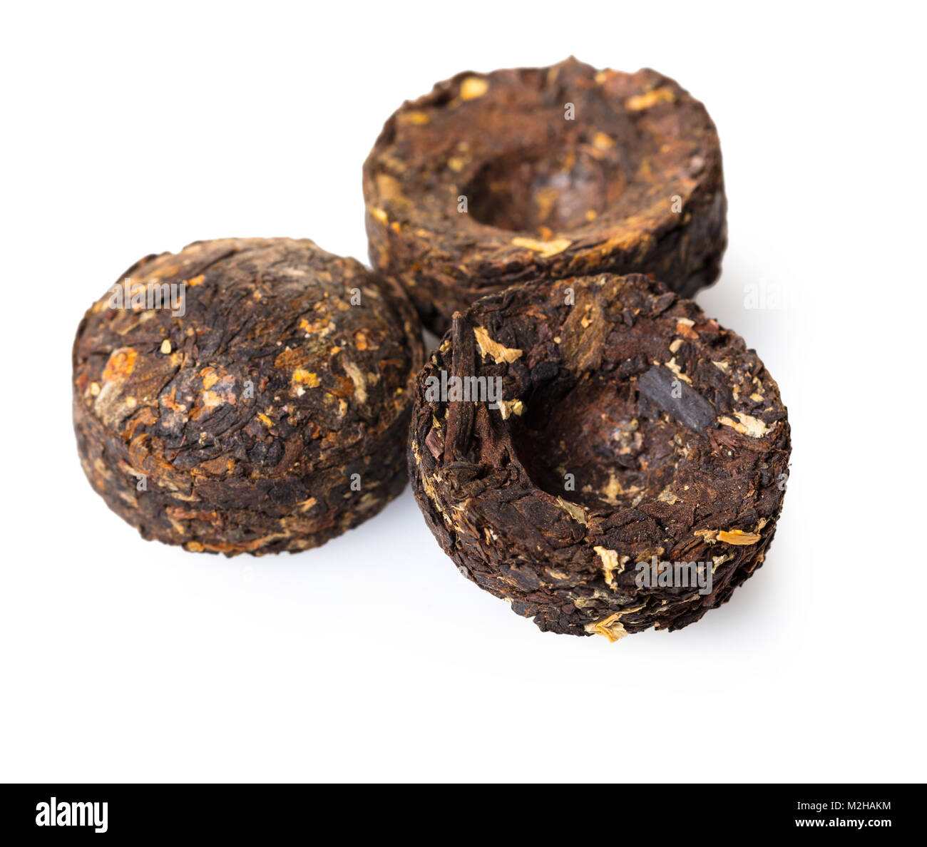 dry black tea pressed round shape, white isolated background Stock ...