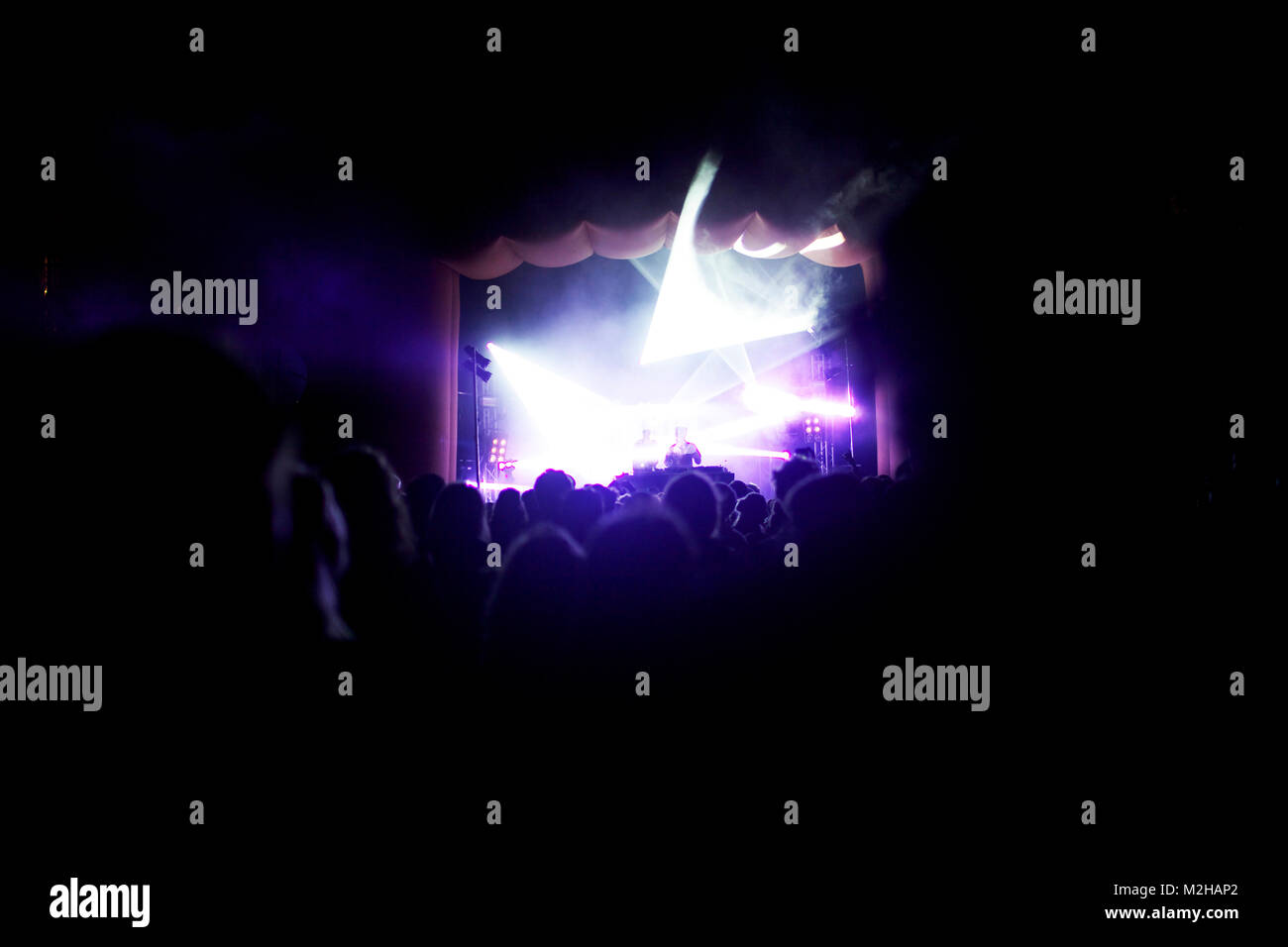 Light beams from the stage lights create the perfect atmosphere at a ...