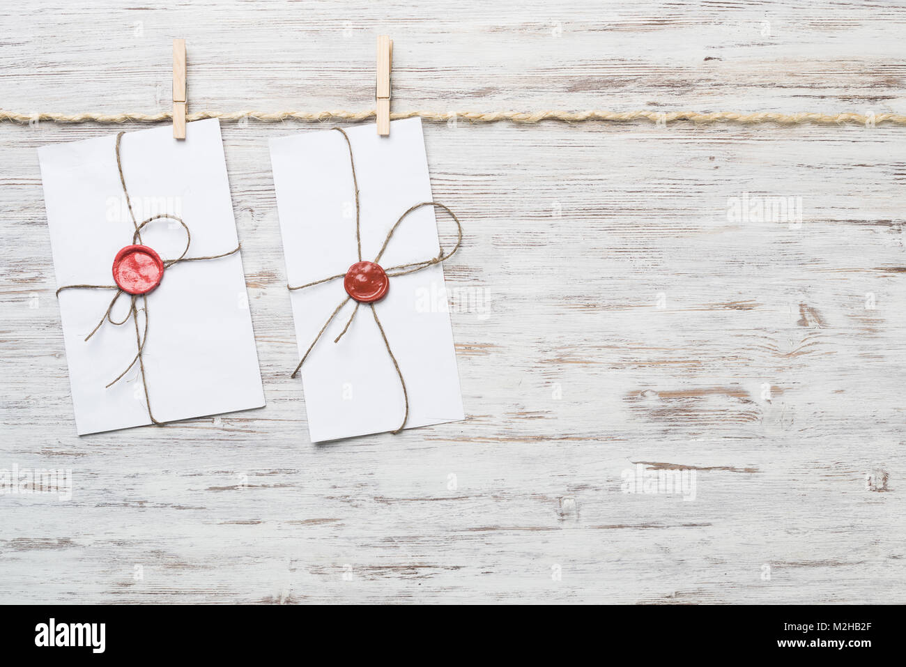 Mail envelope on rope Stock Photo - Alamy