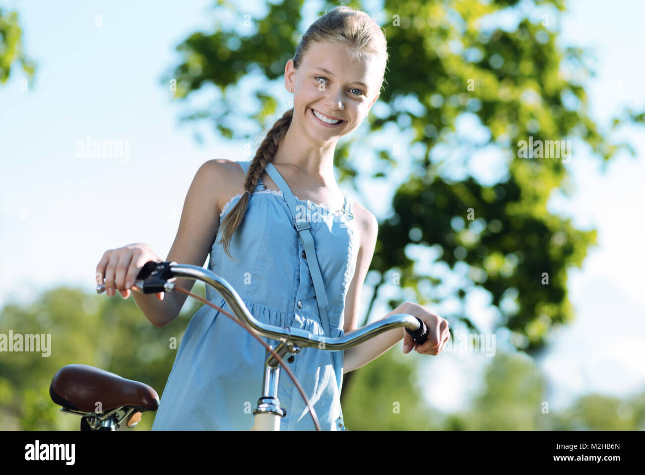 Cheerful nice girl feeling happy Stock Photo - Alamy