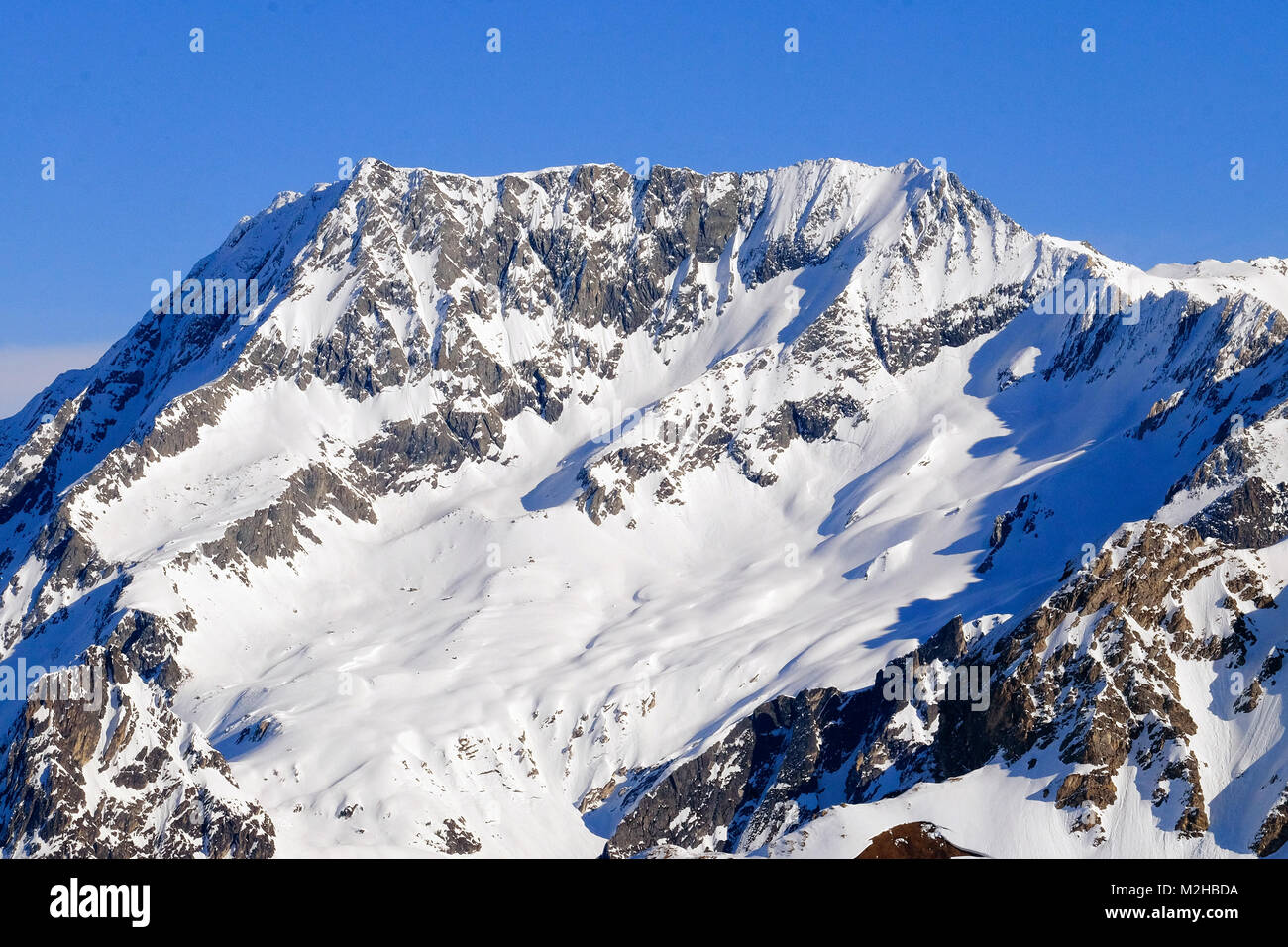 a view of french alpine mountain peaks with snow Stock Photo - Alamy
