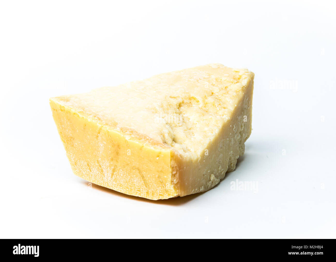 Italian original Parmesan cheese on white background Stock Photo - Alamy
