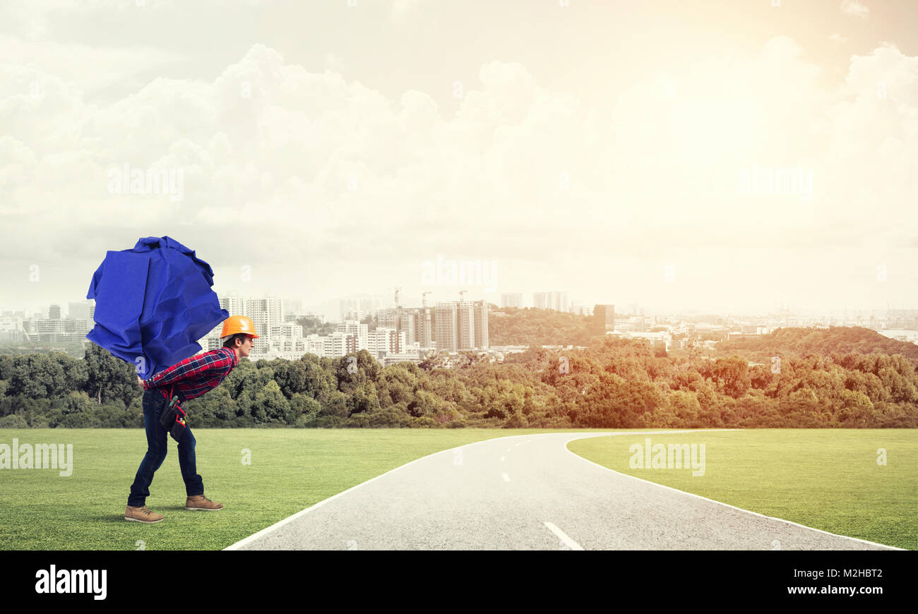 Engineer man carry load Stock Photo - Alamy