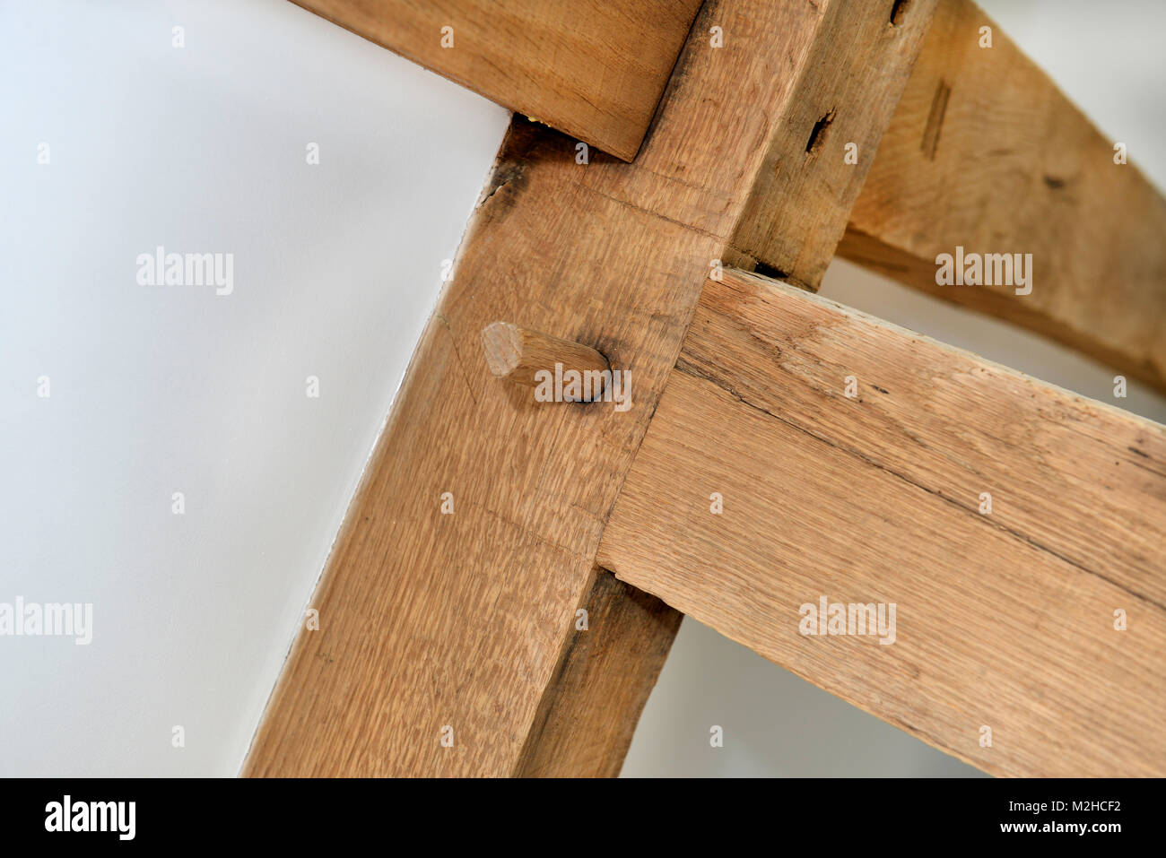 a detail of a wooden joint in building rafter Stock Photo - Alamy
