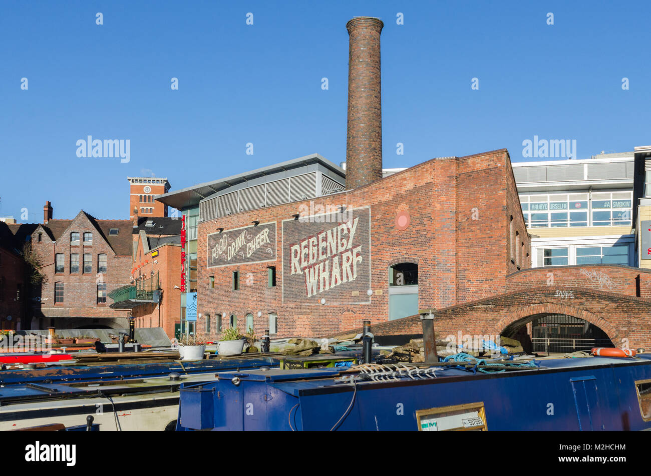 Old red brick warehouse building at Regency Wharf in Gas Street Basin ...