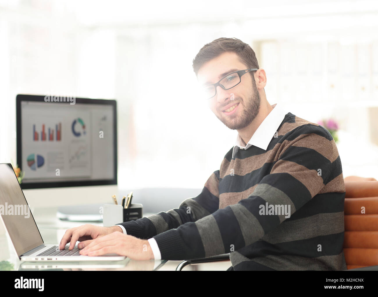 successful employee at a Desk Stock Photo - Alamy