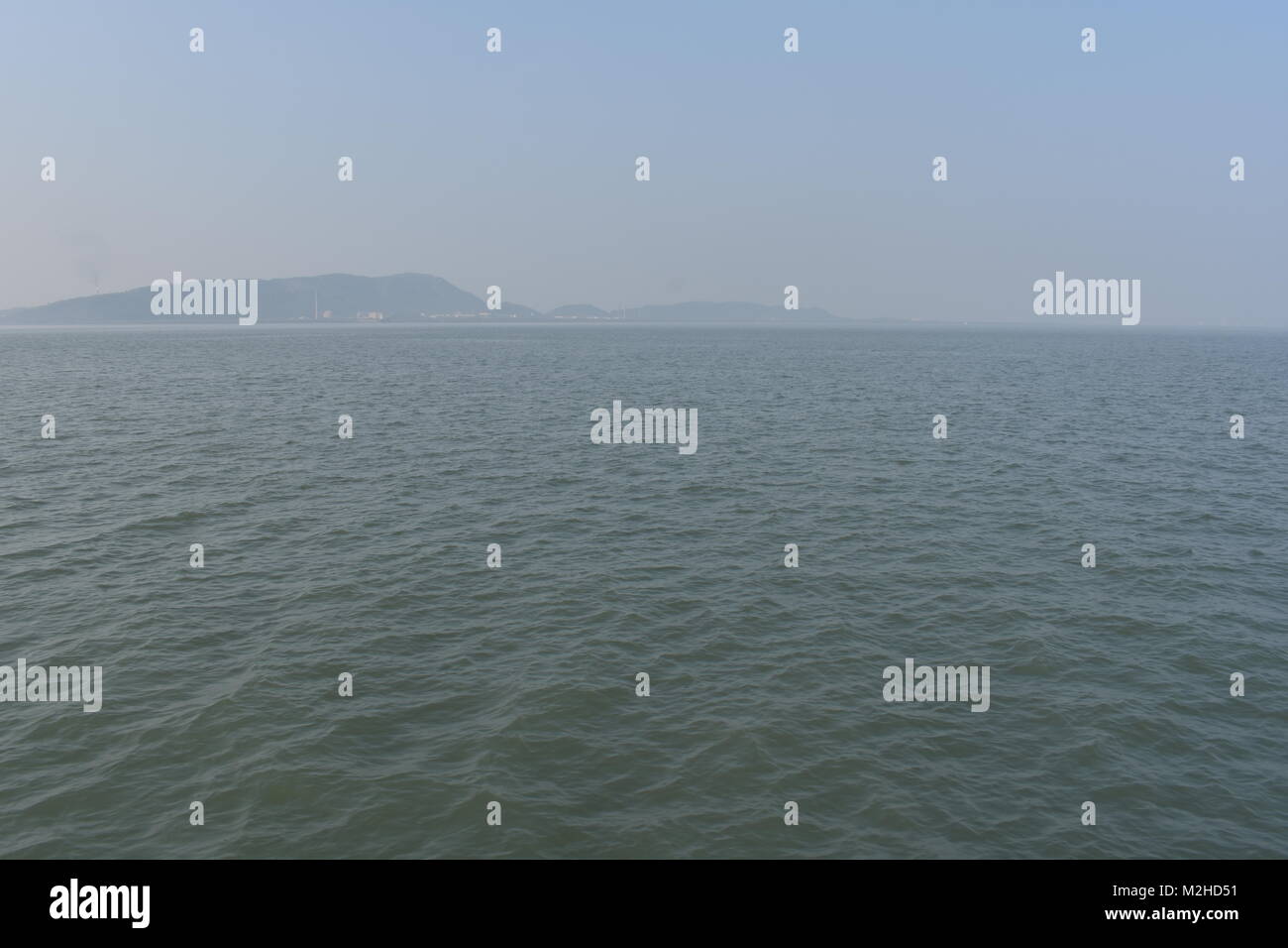 Deep blue sea water with small tide Stock Photo - Alamy