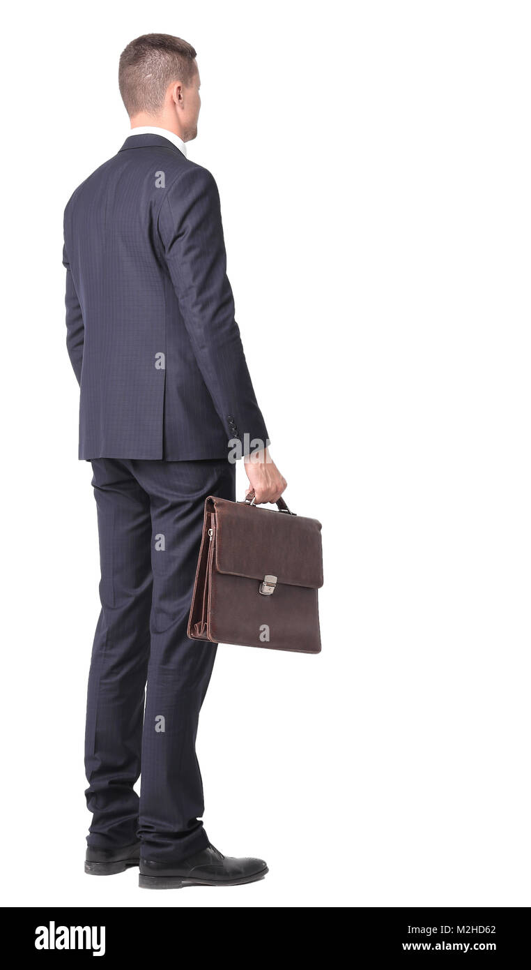 side view.portrait of confident businessman with briefcase Stock Photo ...