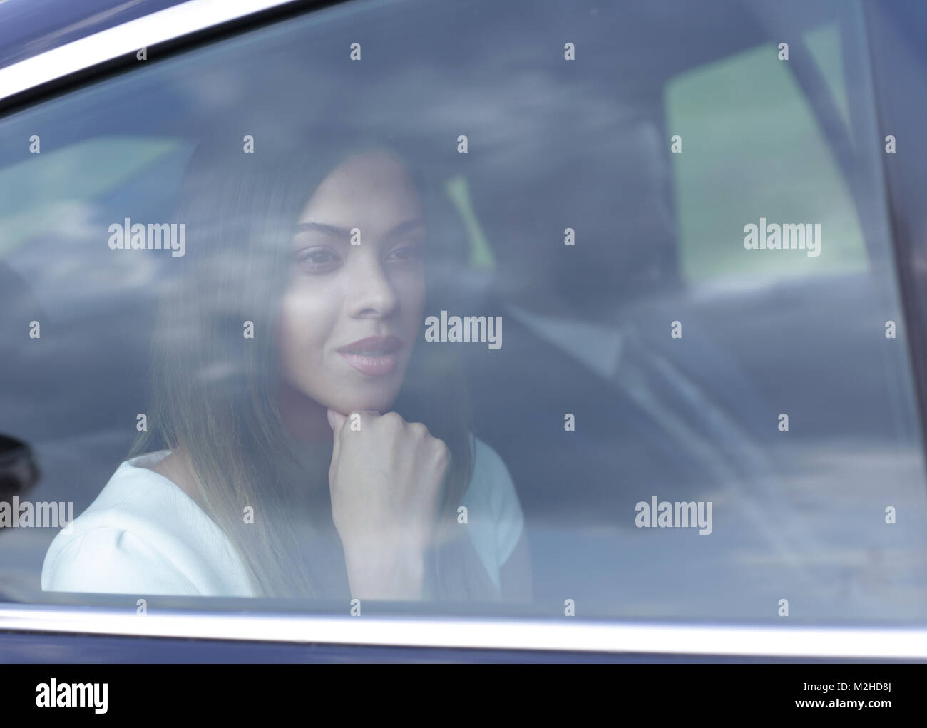 thoughtful business woman sitting in car backseat Stock Photo - Alamy thoughtful business woman sitting in car backseat Stock Photo - Alamy